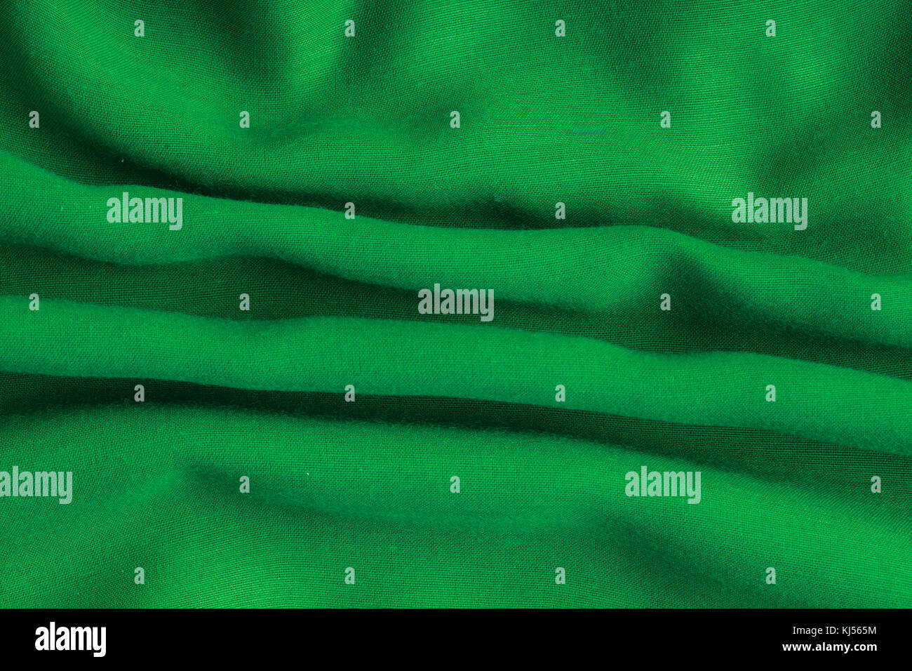 green background abstract cloth wavy folds of textile texture wallpaper ...