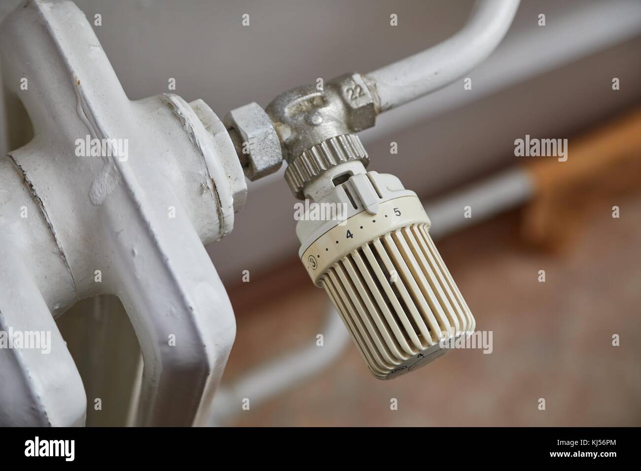 Heating radiator detail in a room Stock Photo - Alamy