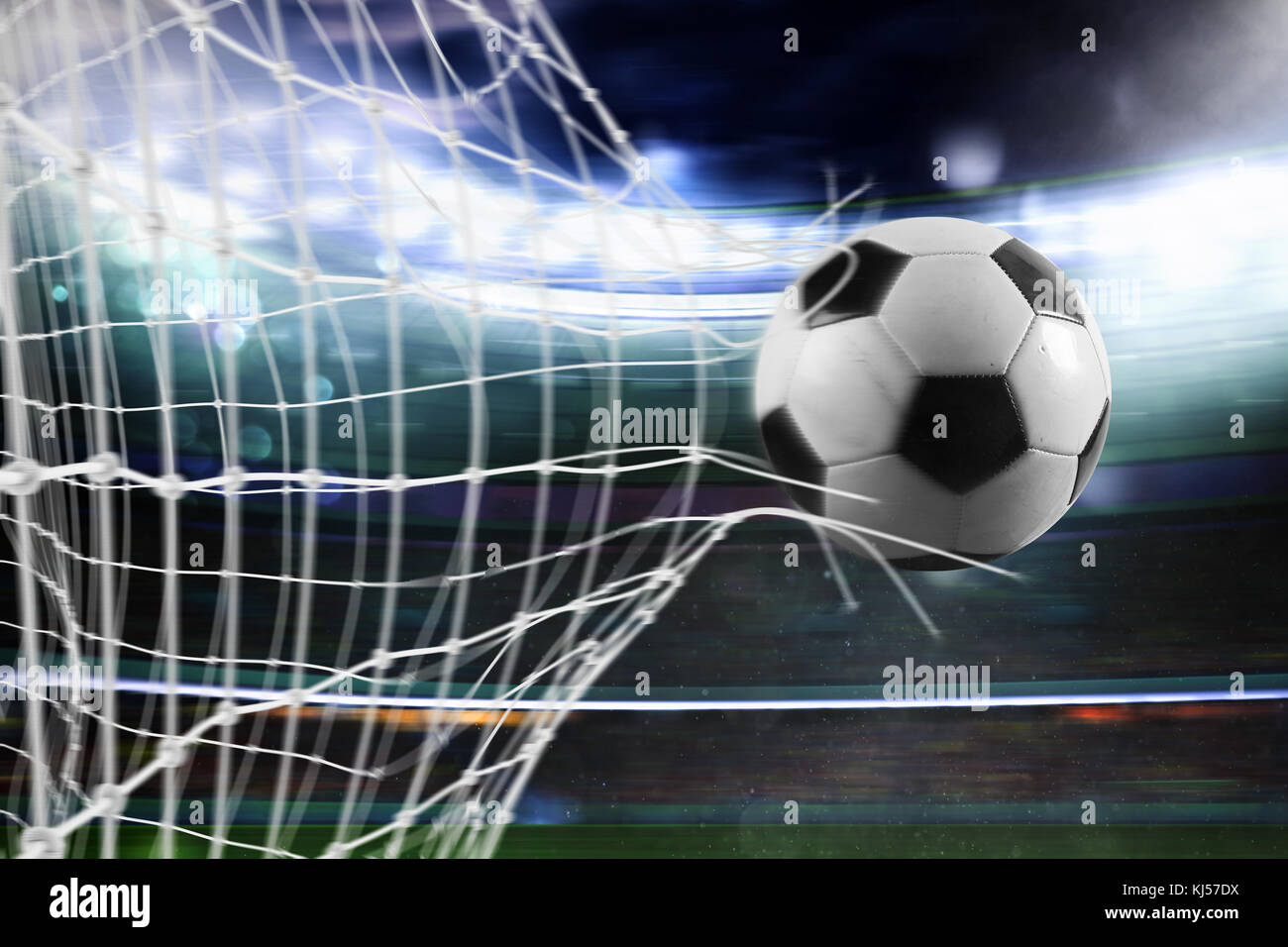 Ball scores a goal on the net in a football match Stock Photo - Alamy