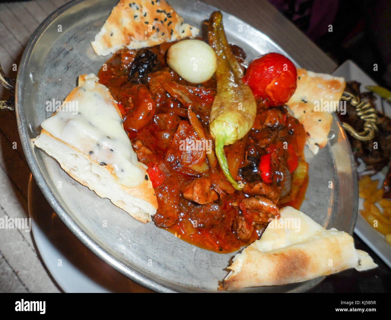 A traditional Turkish restaurant meal of Ottoman style Lamb, Osmanlu ...