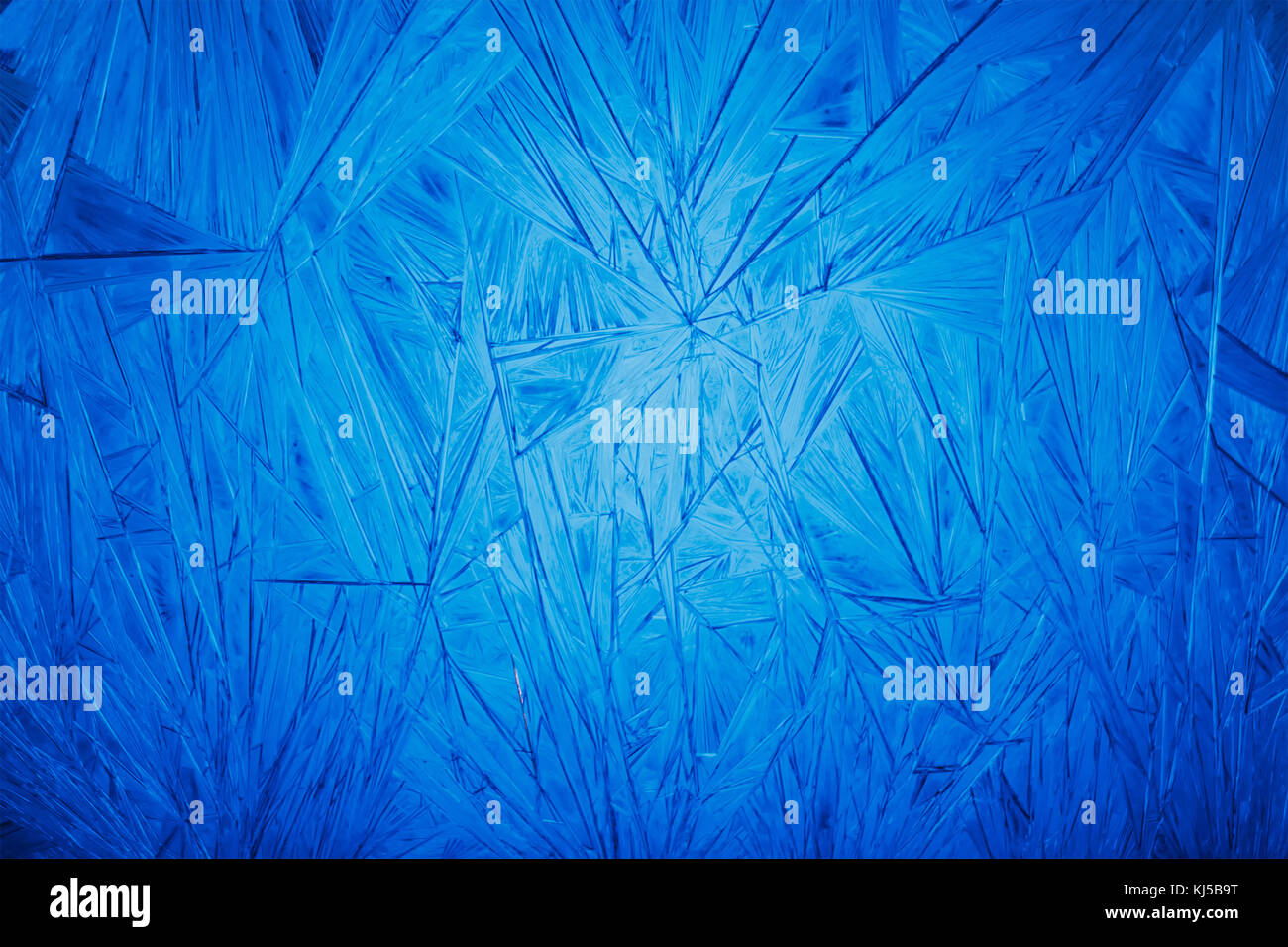 Frozen crystals on the glass. Abstract background. New year pattern ...