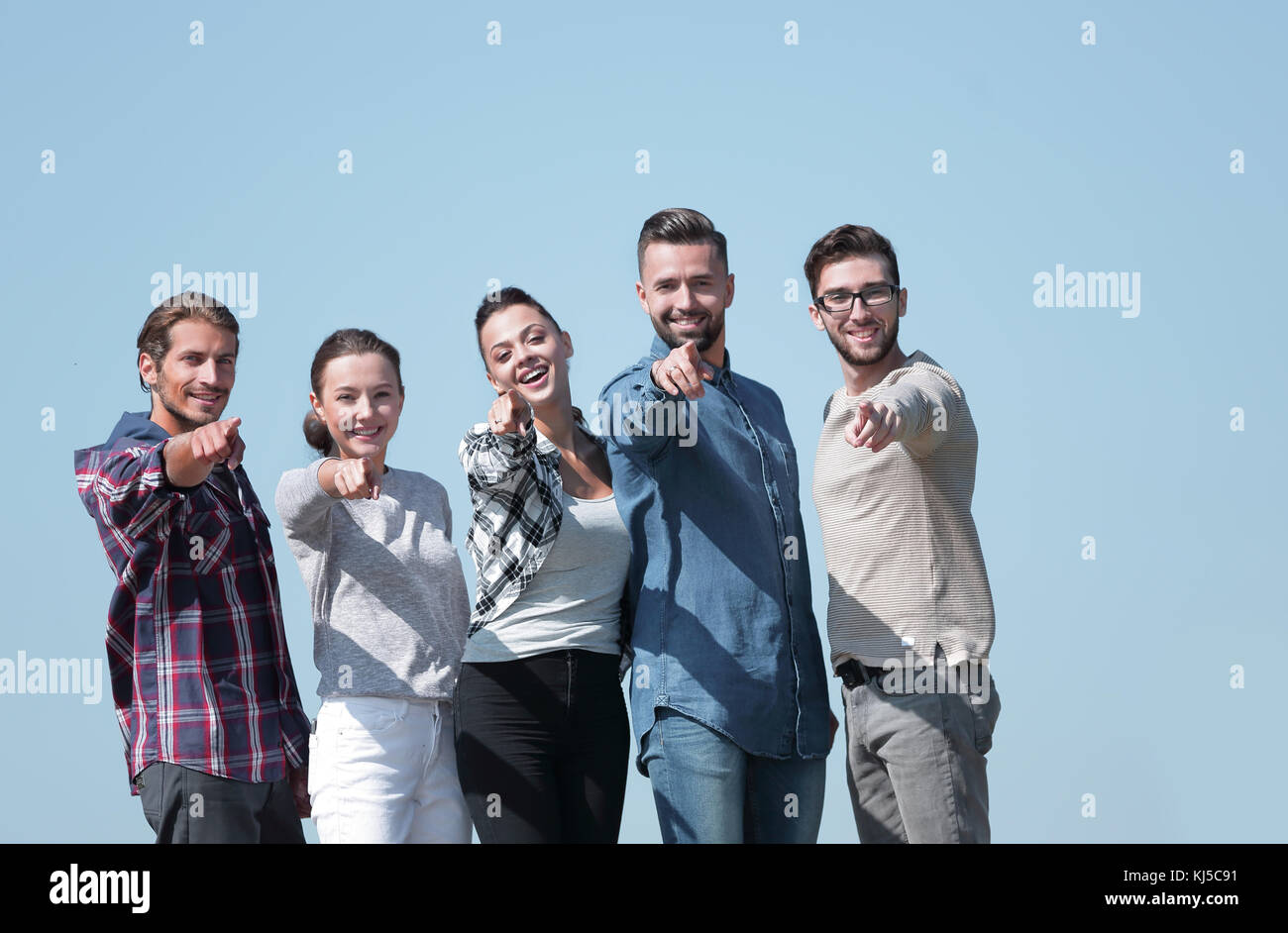 team of young people showing hands forward Stock Photo - Alamy