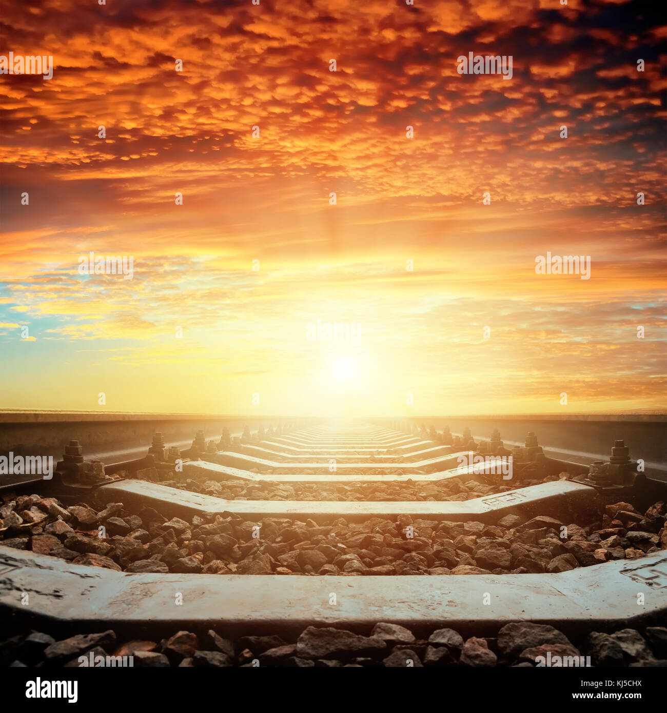railroad closeup and sunset over it in red sky Stock Photo - Alamy