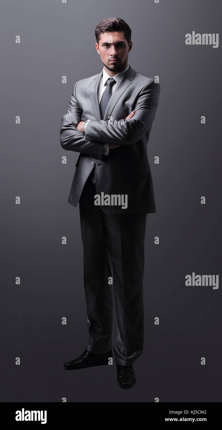 portrait in full growth. a successful business man Stock Photo - Alamy