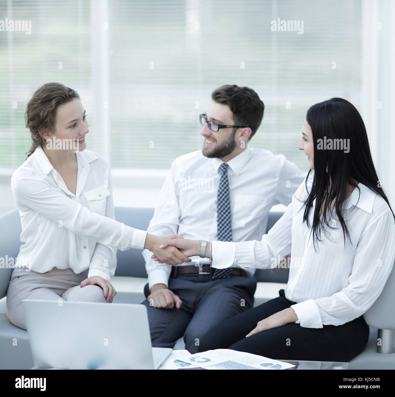 handshake of manager and client in the office lobby Stock Photo - Alamy