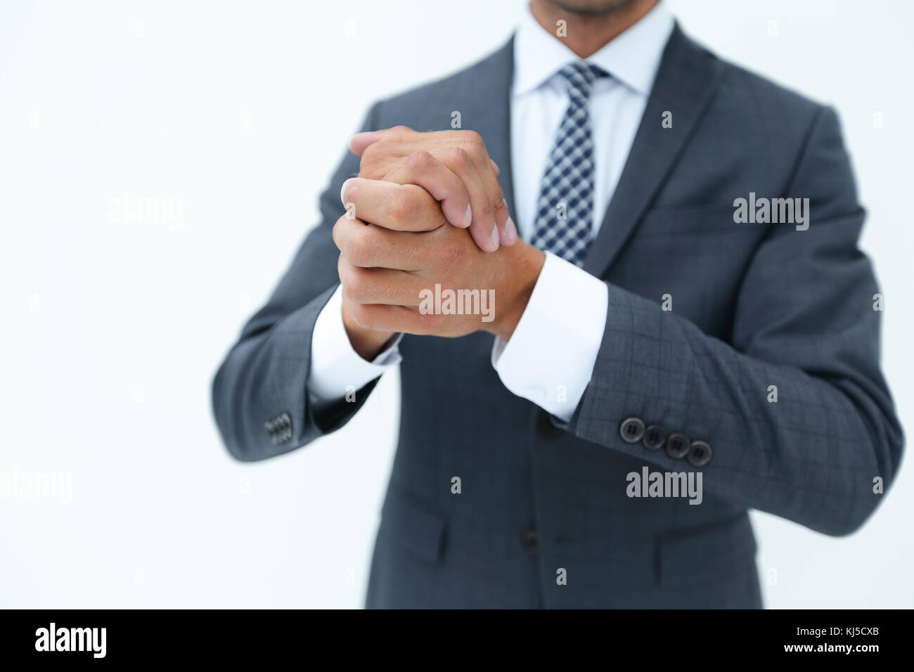 Close up on male clenched hands Stock Photo - Alamy