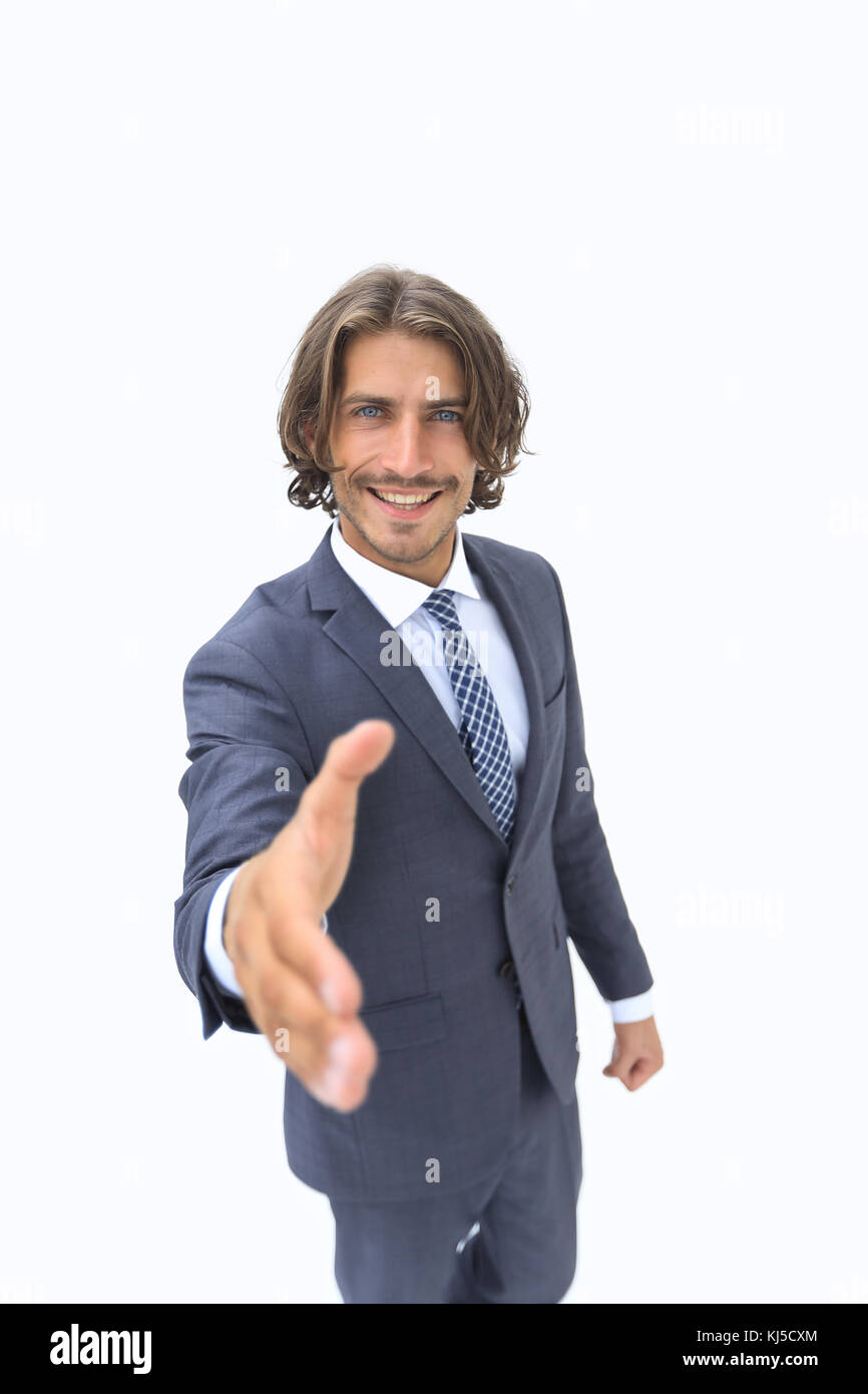 Businessman offering for handshake Stock Photo - Alamy