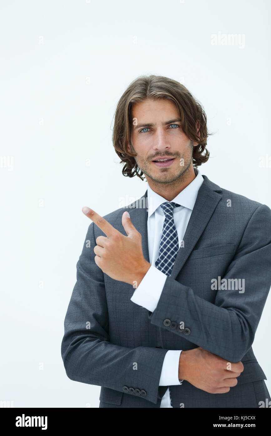 a young and handsome businessman pointing up with his finger Stock ...