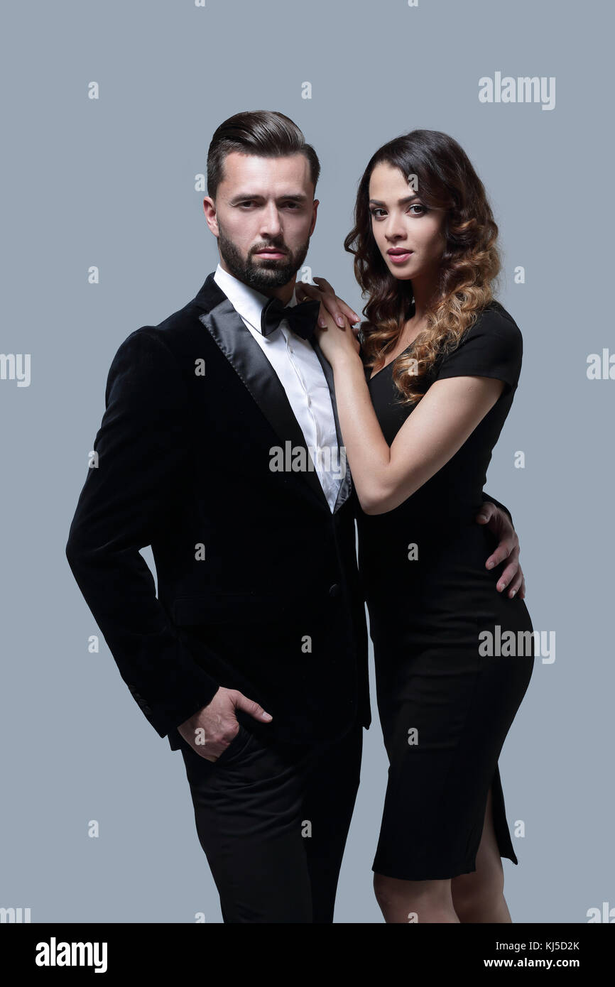 Business partners standing on a gray background Stock Photo - Alamy