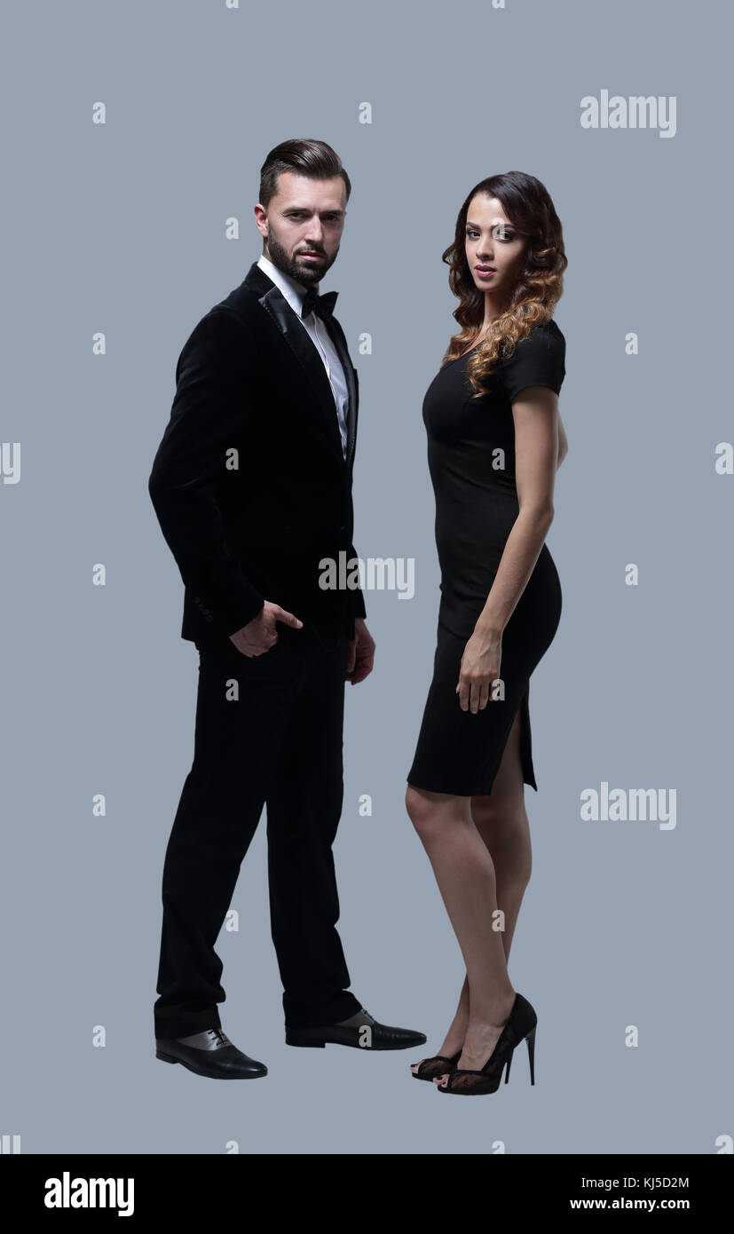 Business partners standing on a gray background Stock Photo - Alamy