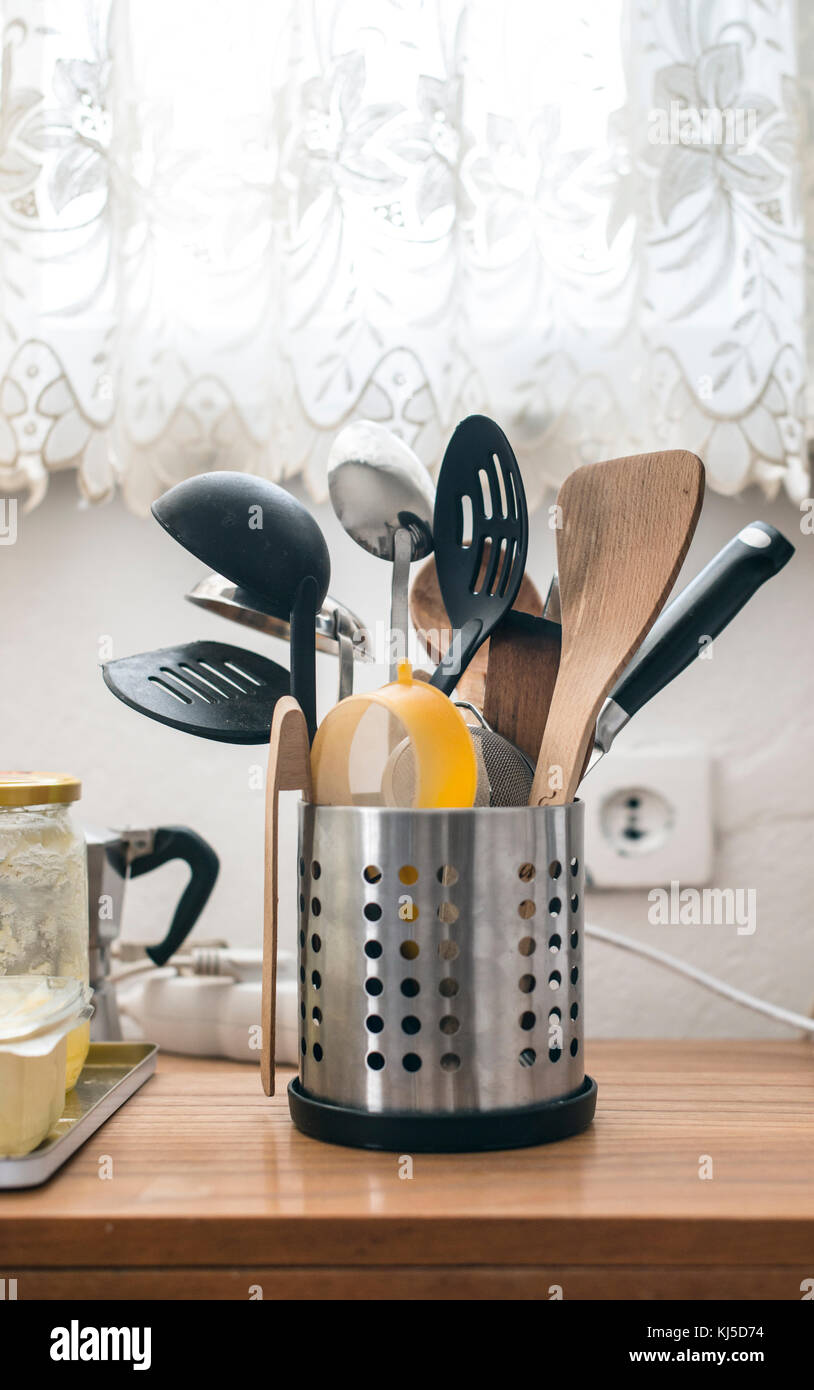 Cooking accessories to the window Stock Photo - Alamy