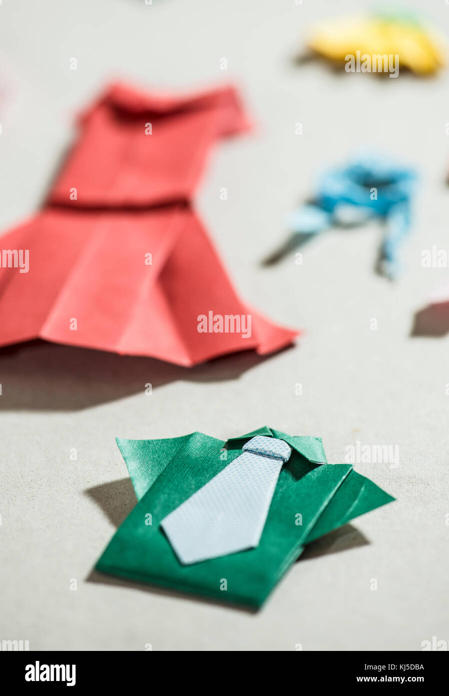 Many clothes origami. Made of paper fugures Stock Photo - Alamy
