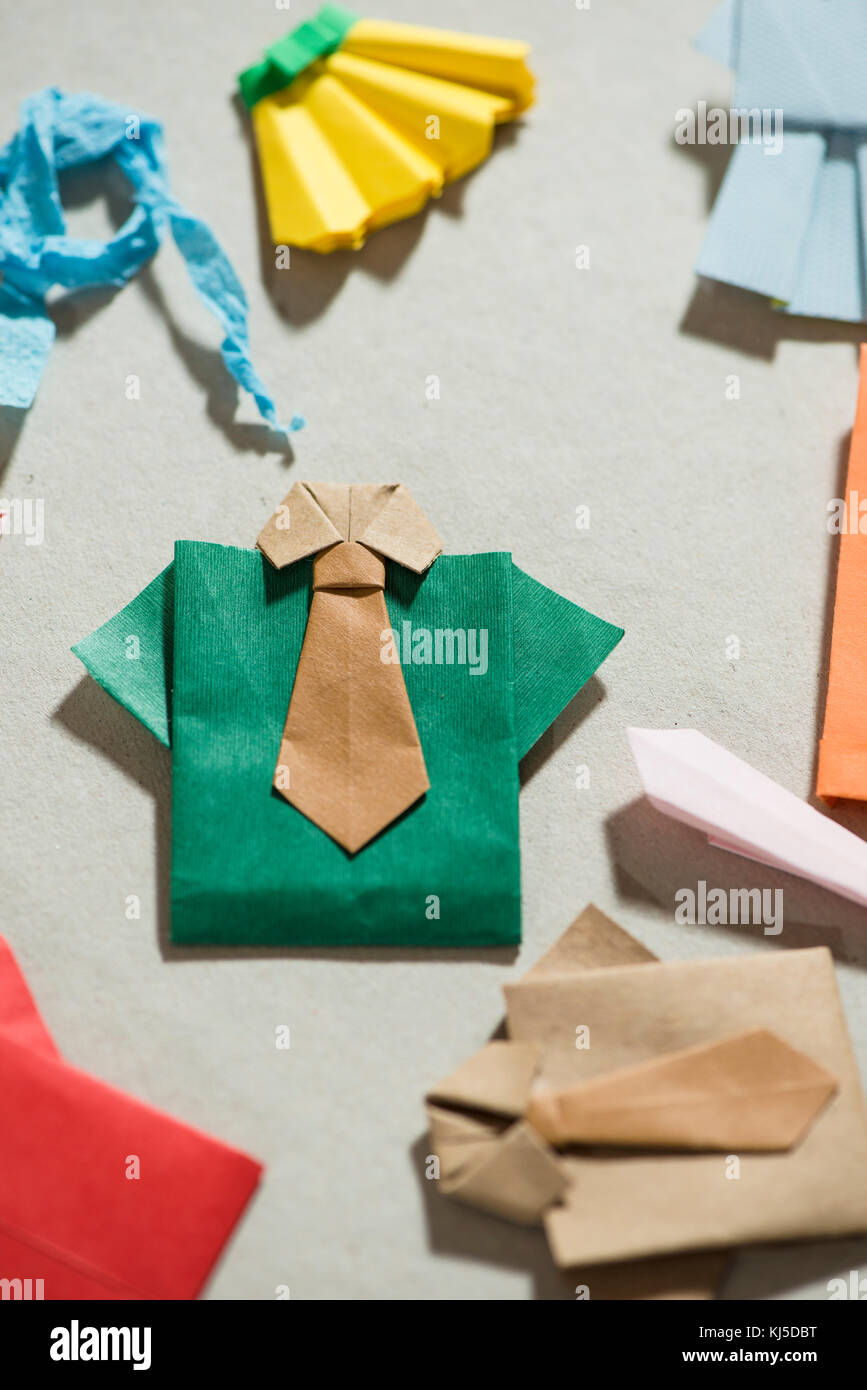 Many clothes origami. Made of paper fugures Stock Photo - Alamy