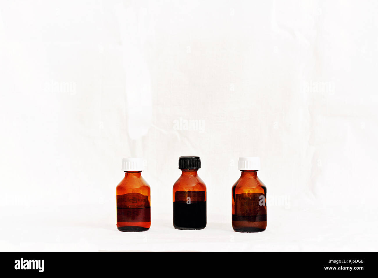 Three bottles with medicinal tinctures isolated white background Stock ...