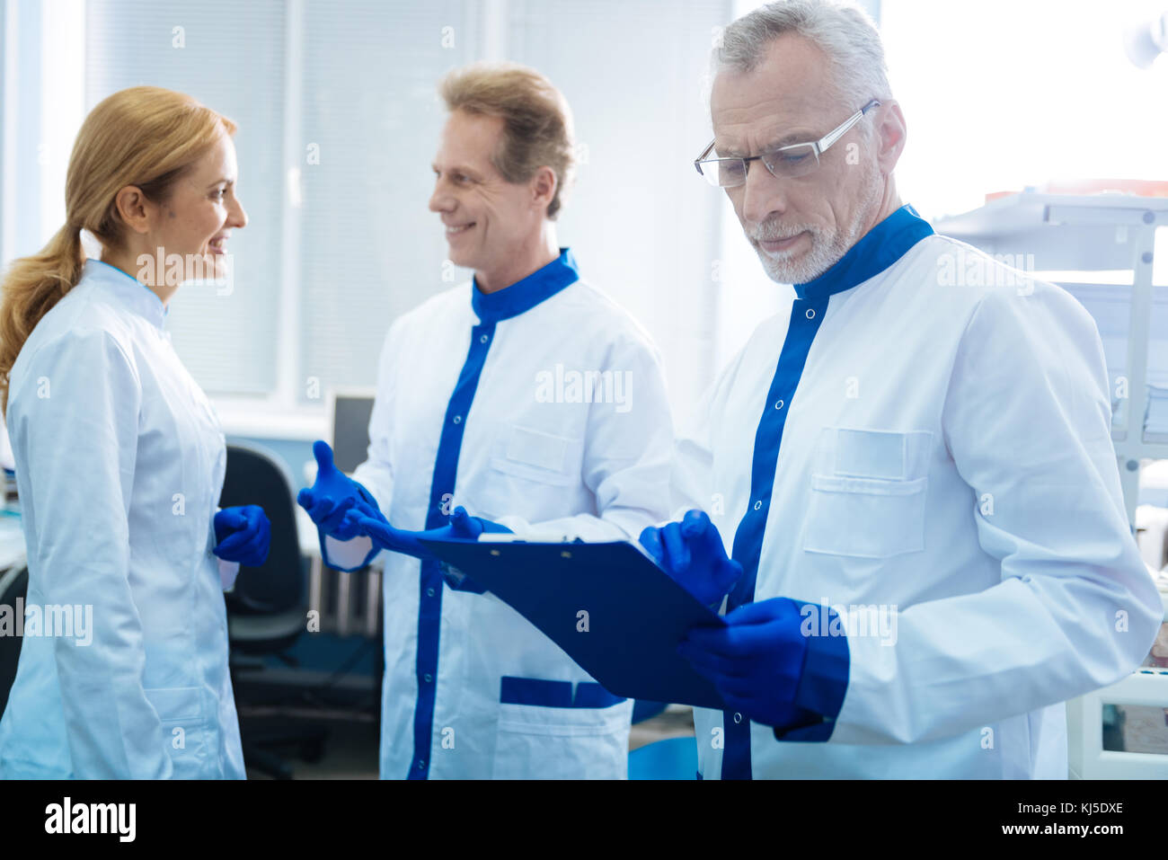 Experienced researchers working in the lab Stock Photo - Alamy
