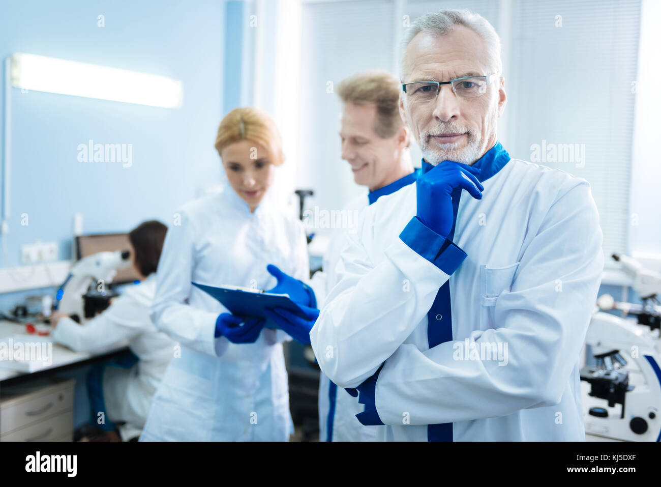 Scientist with others hi-res stock photography and images - Alamy