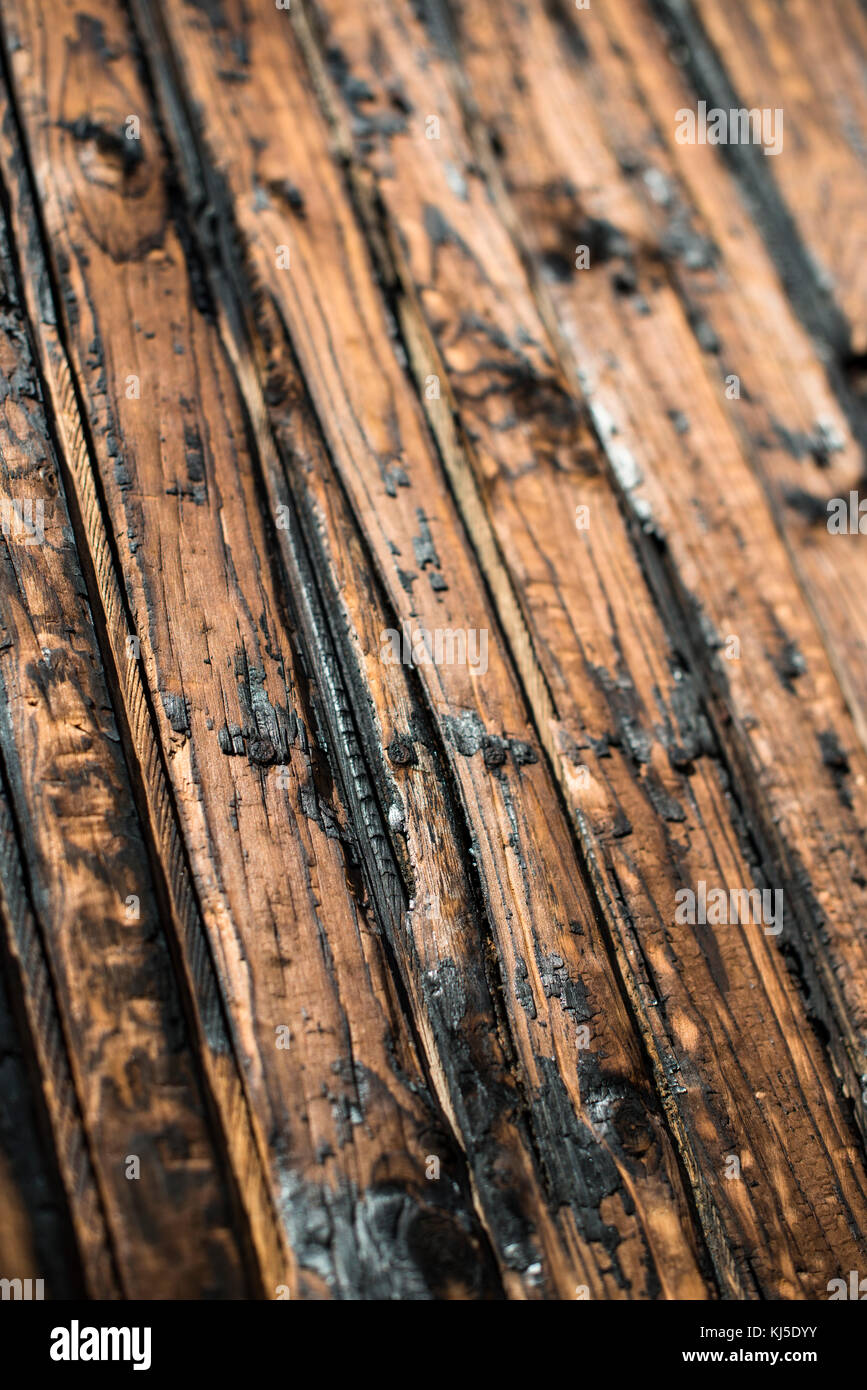 Burnt wooden boards background Stock Photo - Alamy