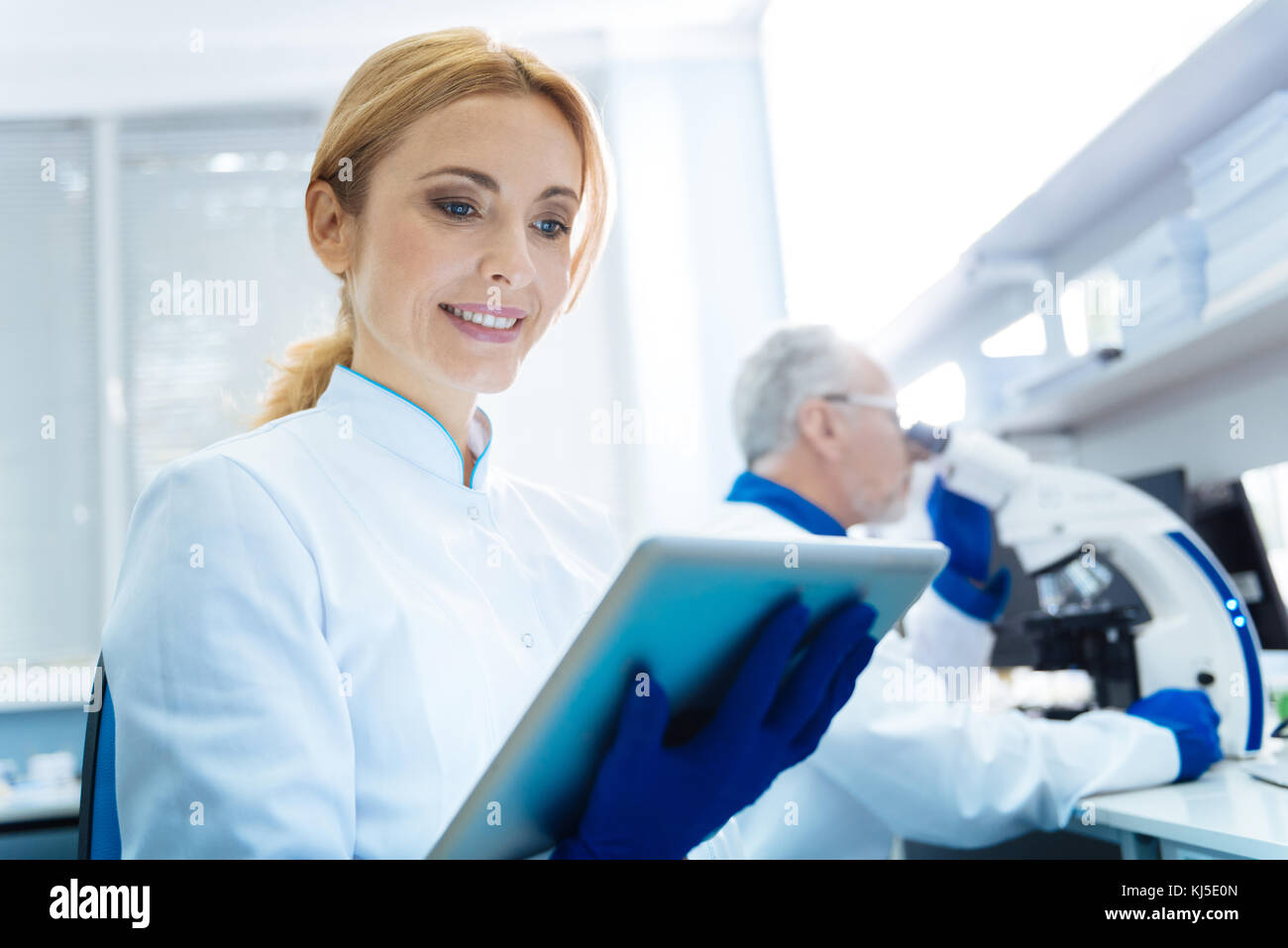 Happy smiling woman scientist in the lab Stock Photo - Alamy