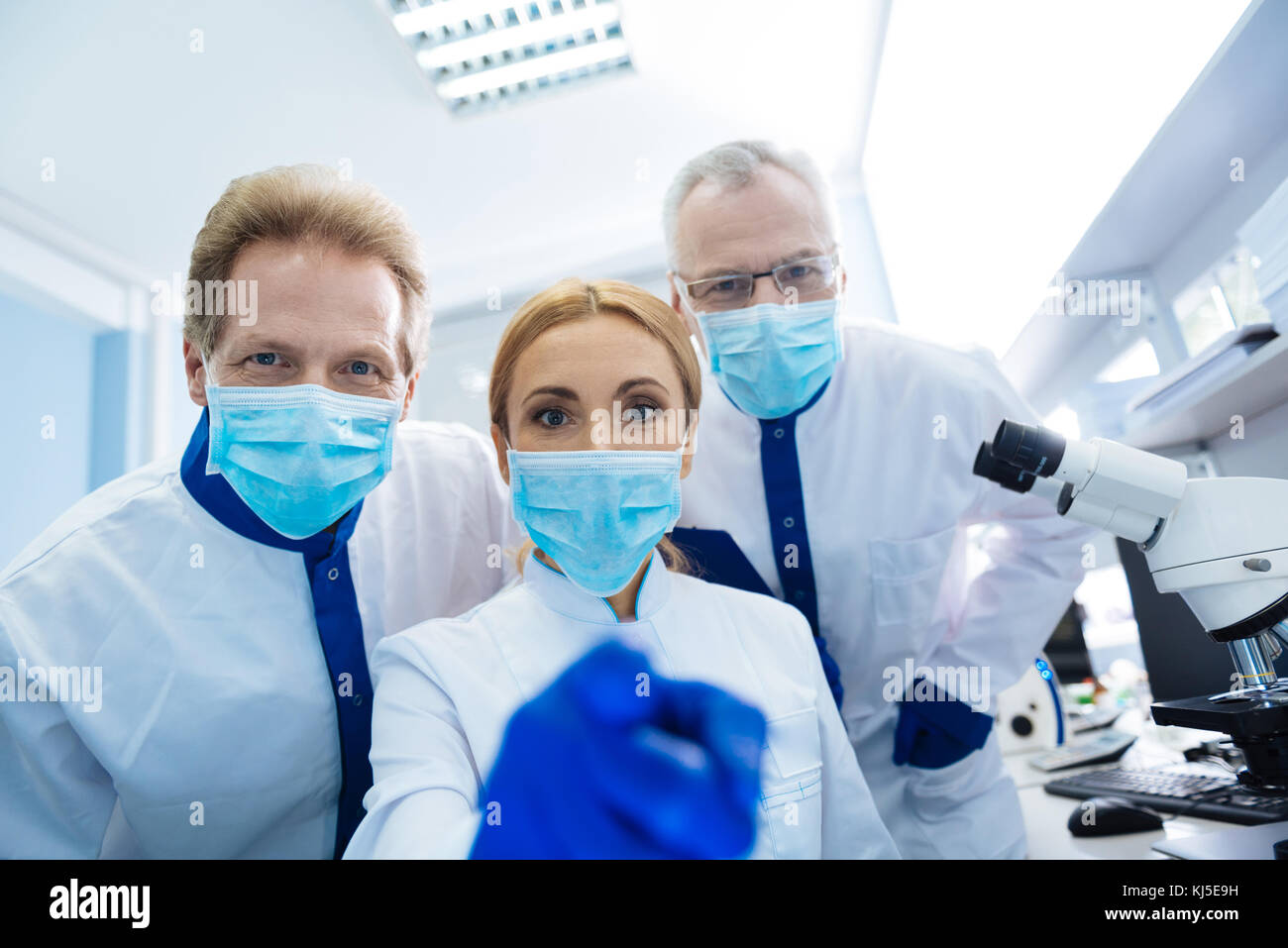 Researchers in modern laboratory hi-res stock photography and images ...