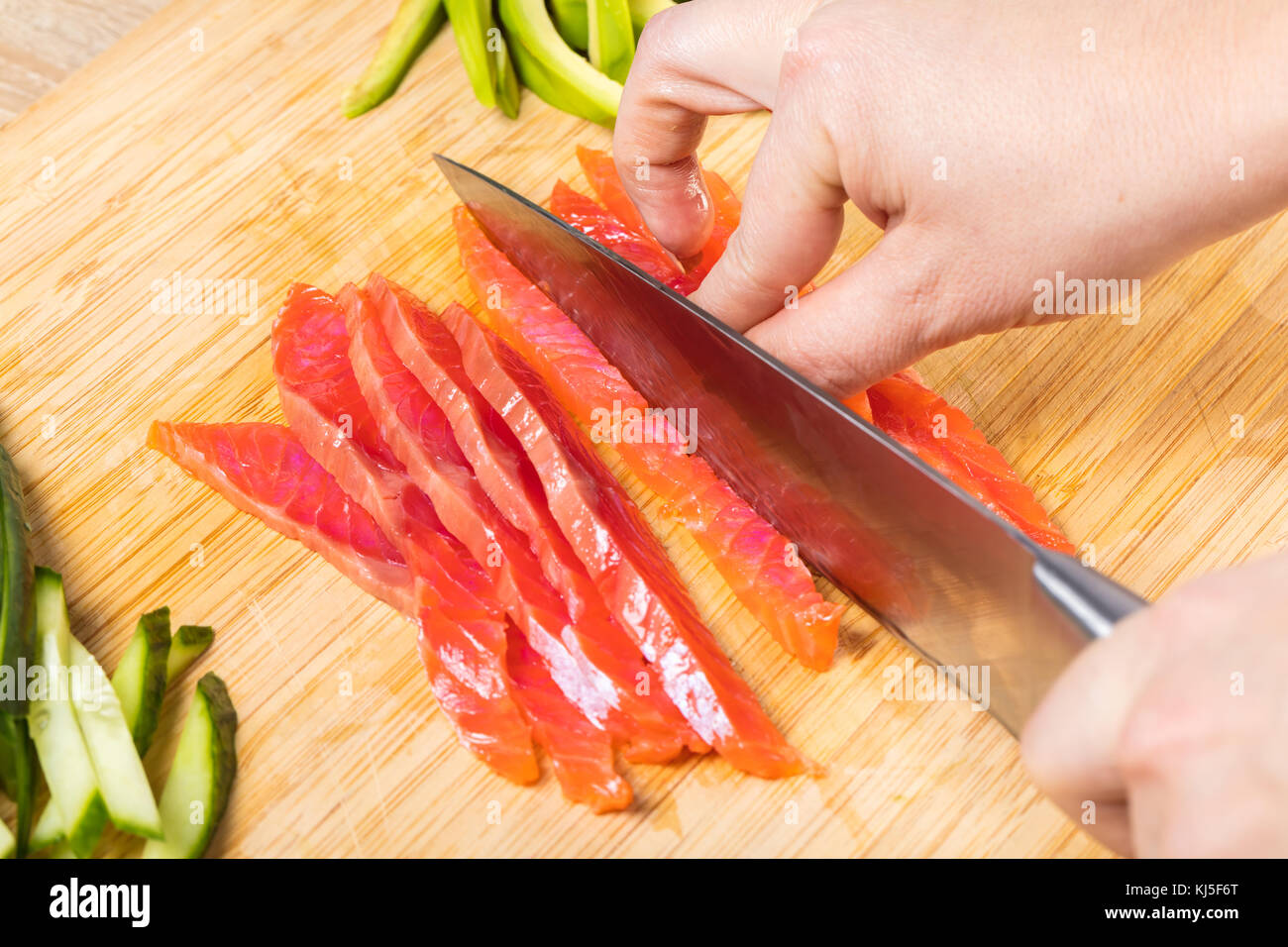Professional chef hands cutting avocado hi-res stock photography and ...