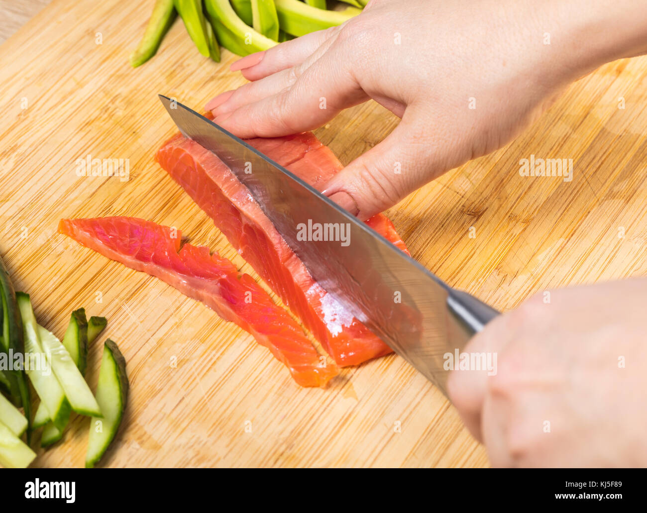 Professional chef hands cutting avocado hi-res stock photography and ...