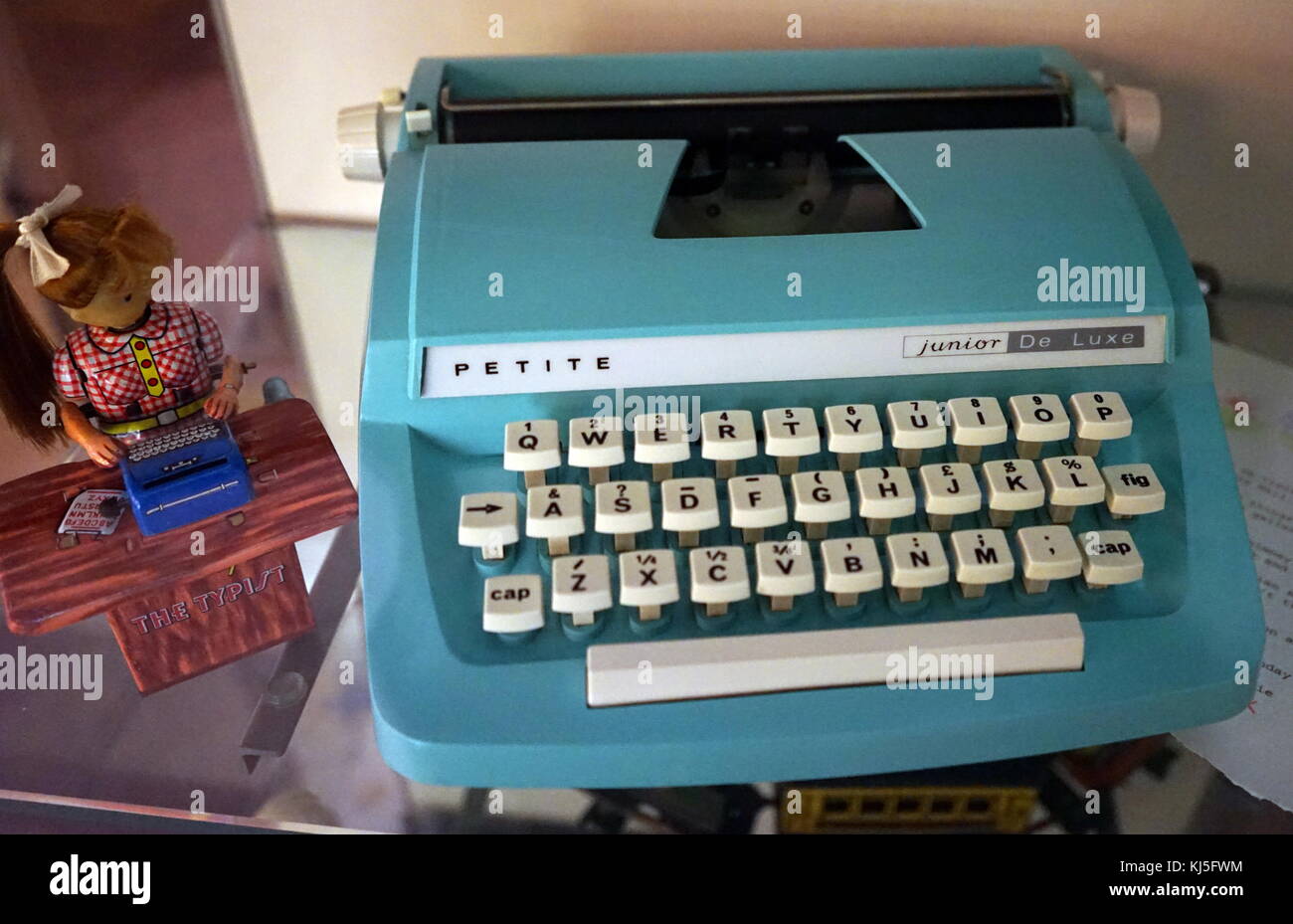 A bright blue junior typewriter designed for young girls. Dated 20th ...