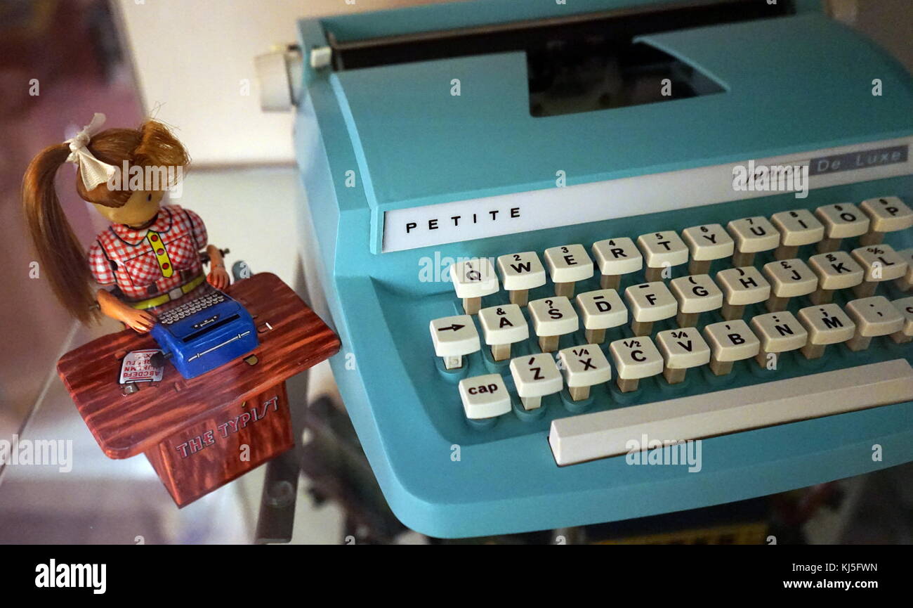 A bright blue junior typewriter designed for young girls. Dated 20th ...