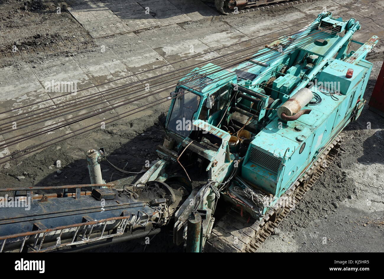 Large construction equipment item with tank treads Stock Photo - Alamy