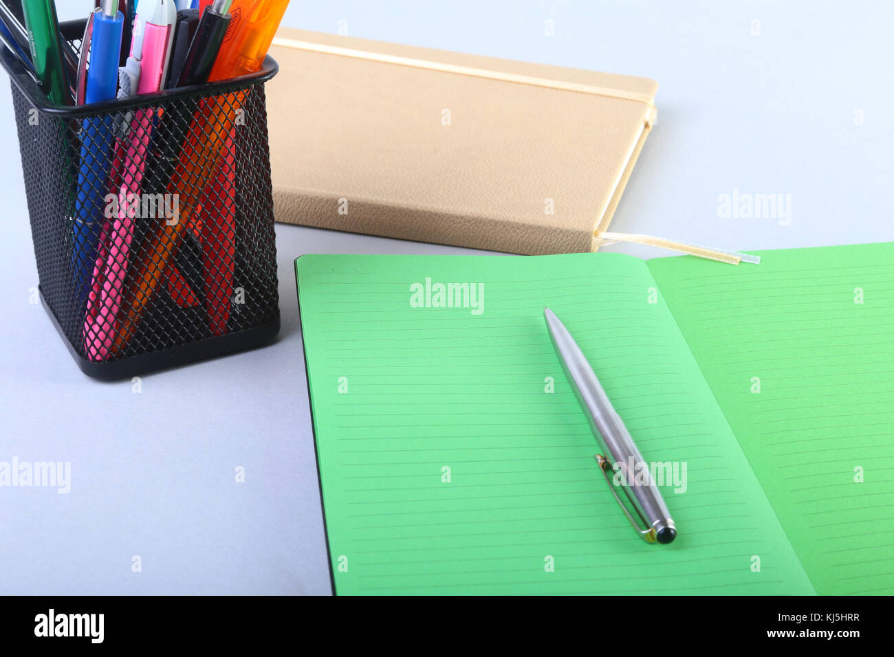 Colorful notebooks and office supplies on white table Stock Photo - Alamy Colorful notebooks and office supplies on white table Stock Photo - Alamy