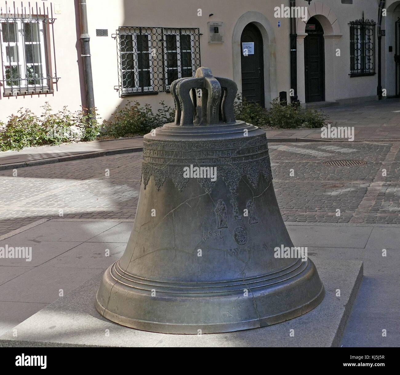 Bell in Kanonia Square, Warsaw Old Town, Poland. In the middle of the ...
