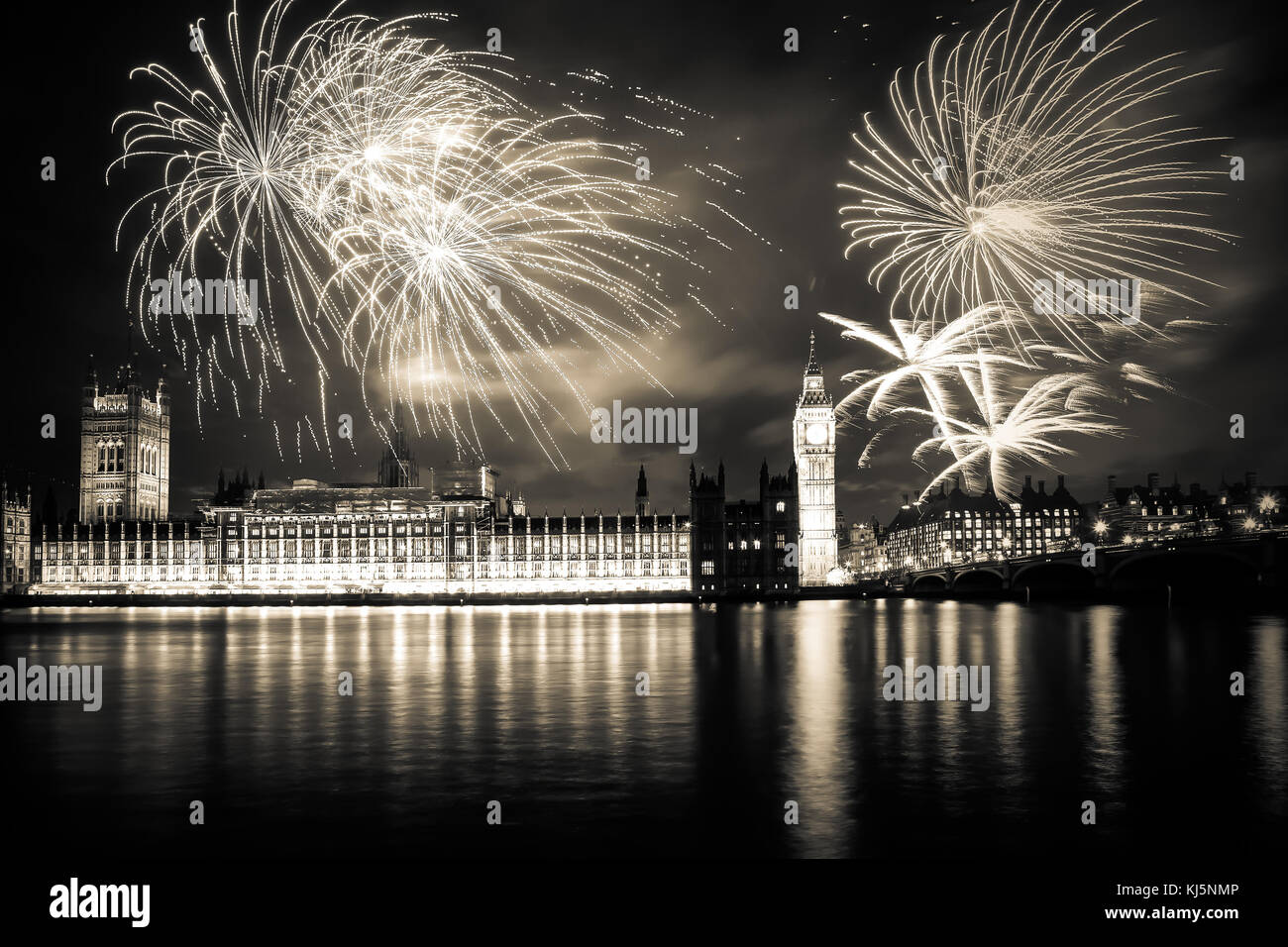 explosive fireworks display fills the sky around Big Ben. New Year's ...