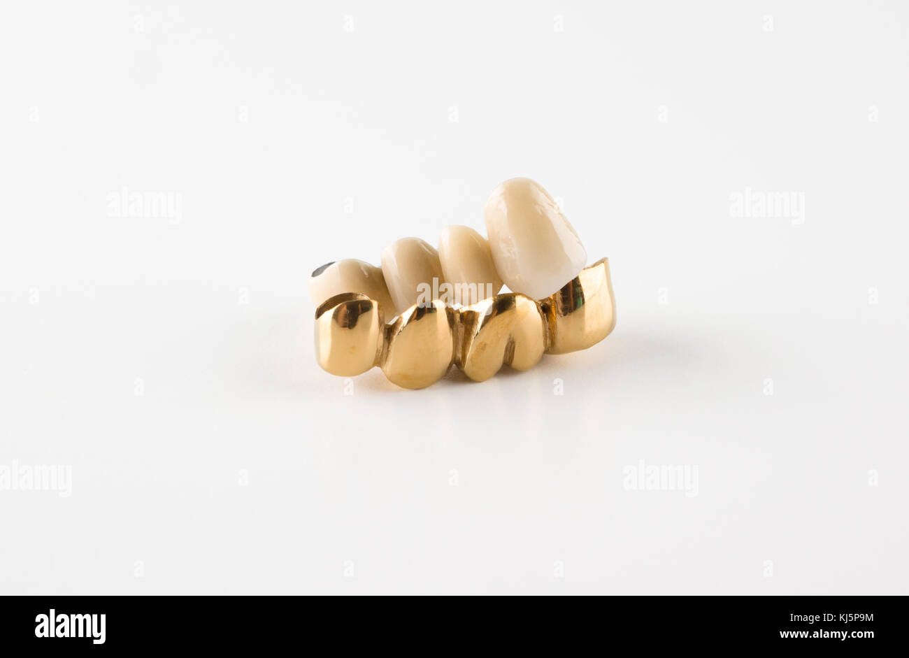 Artificial teeth made of steel with a coating of titanium nitride Stock ...