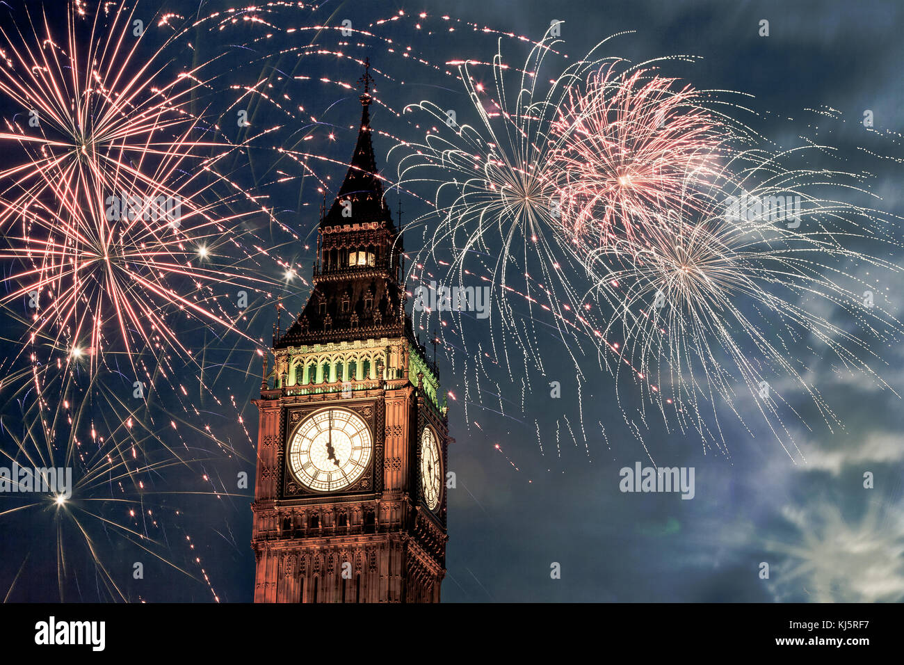 Explosive fireworks display fills the sky around Big Ben. New Year's ...