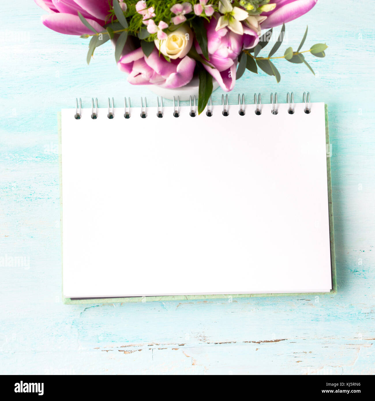 Blank empty notebook page. Spring summer flat lay with colorful roses ...