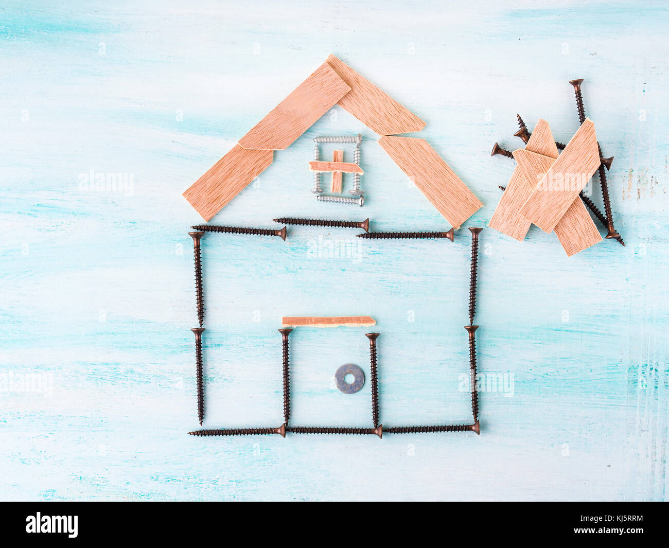 Building house concept flat lay with screw and wood. Bricolage hardware ...