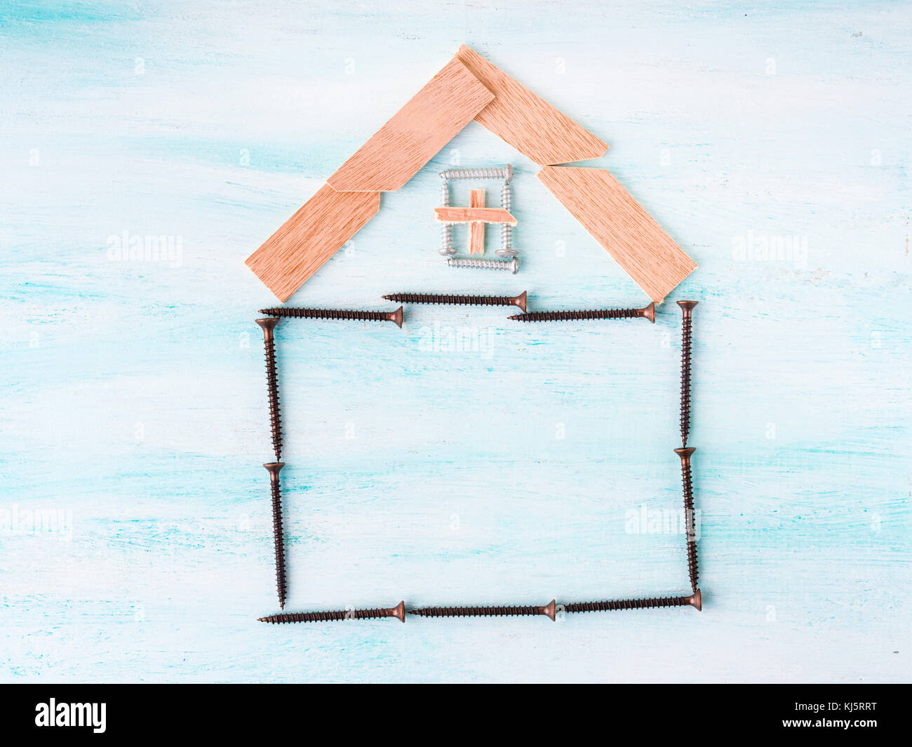 Building house concept flat lay with screw and wood. Bricolage hardware ...