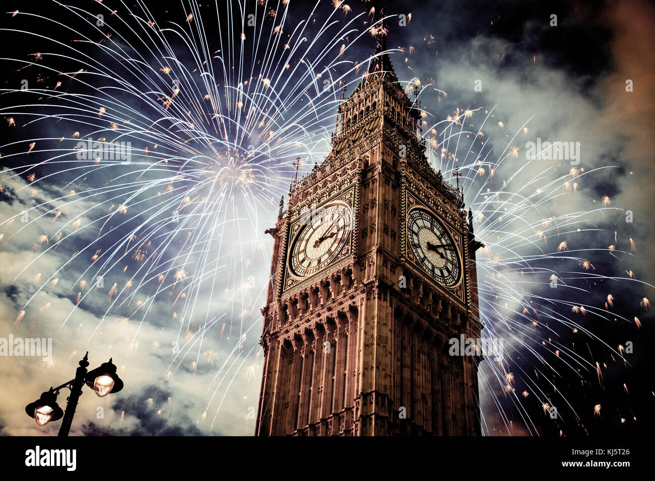 Explosive fireworks display fills the sky around Big Ben. New Year's ...