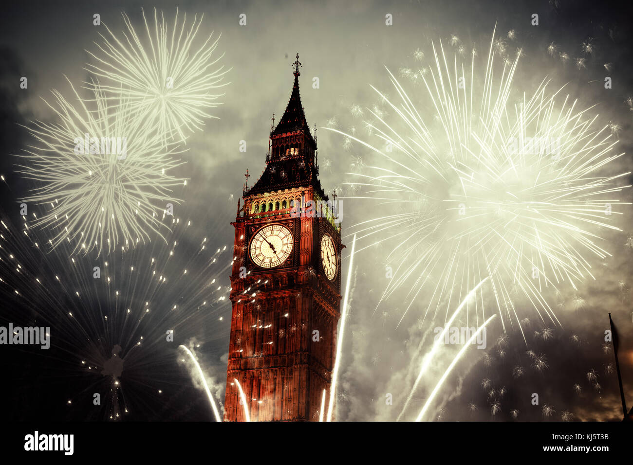 Explosive fireworks display fills the sky around Big Ben. New Year's ...