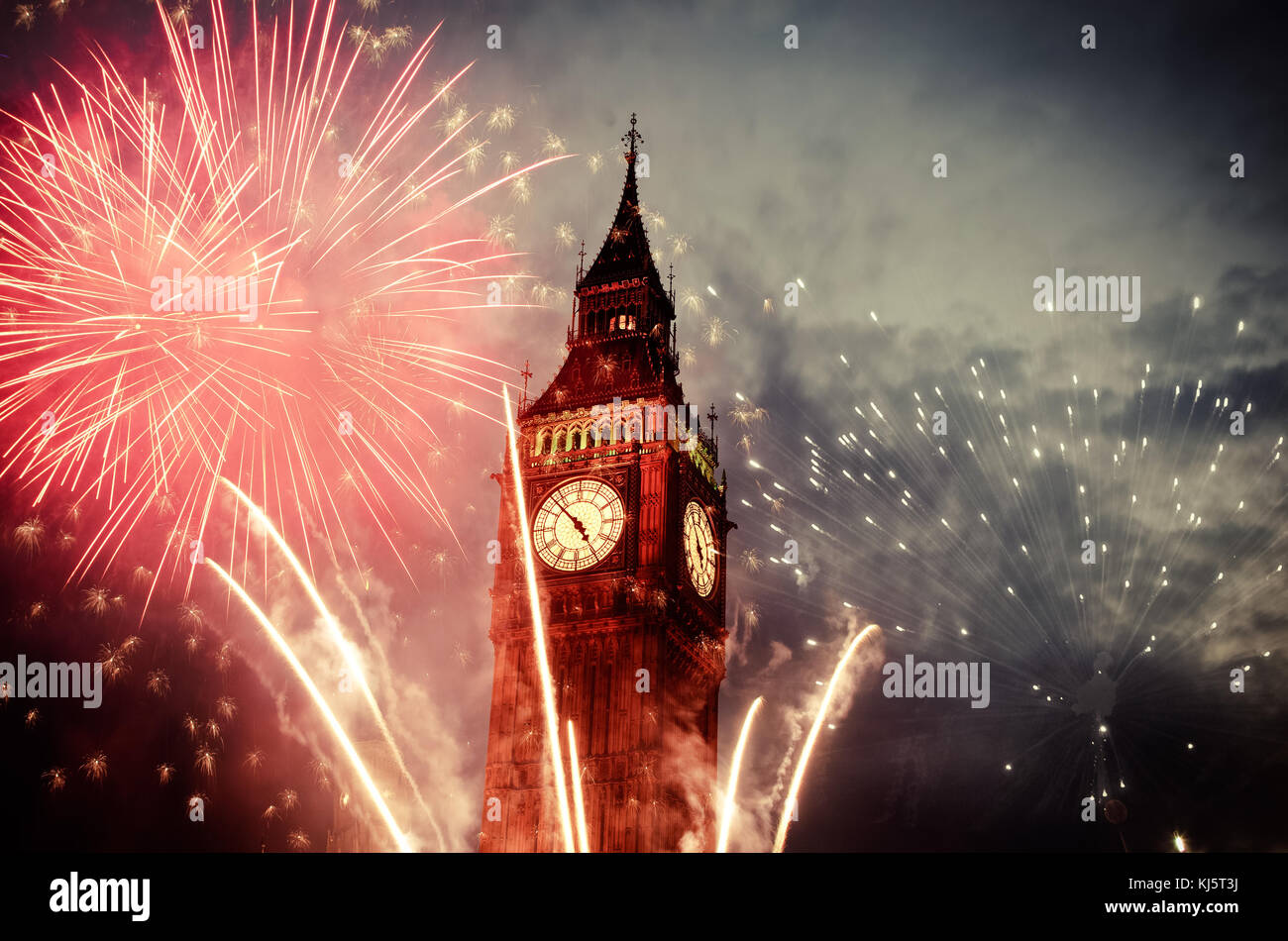 Explosive fireworks display fills the sky around Big Ben. New Year's ...