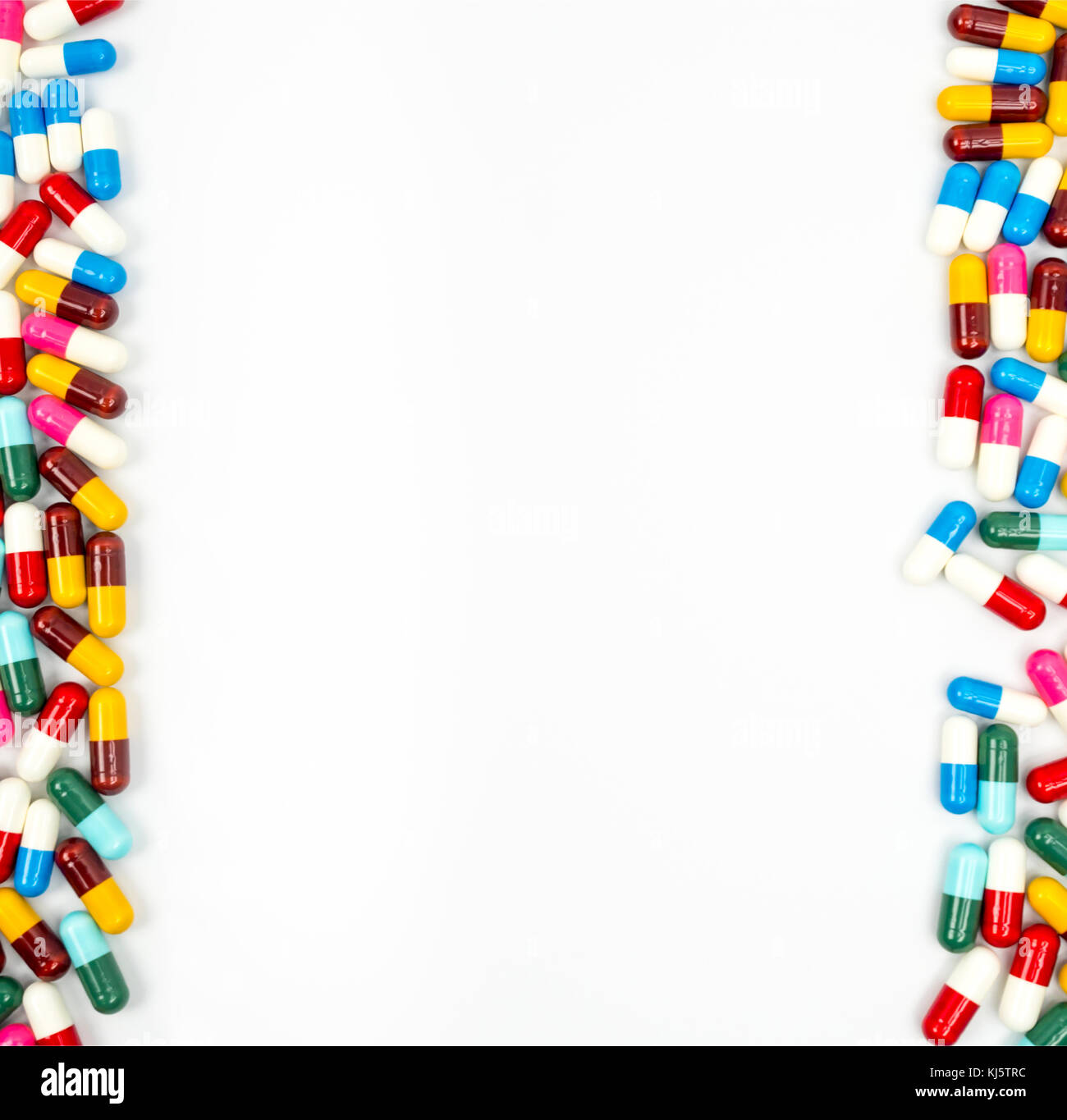 Colorful of antibiotic capsules pills isolated on white background with ...