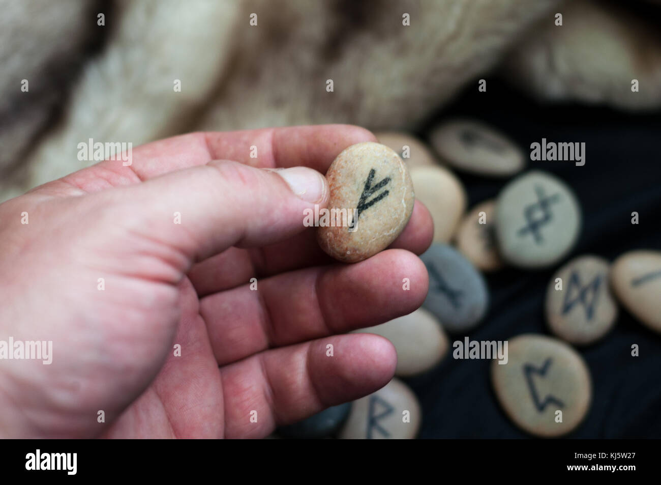 Stone runes hi-res stock photography and images - Alamy