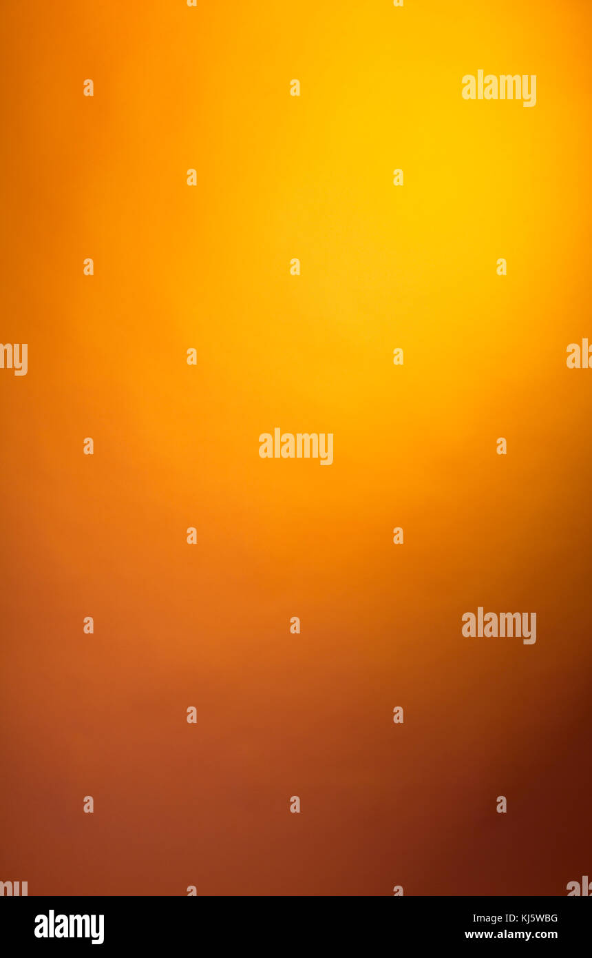 Yello background in the photographic studio Stock Photo - Alamy