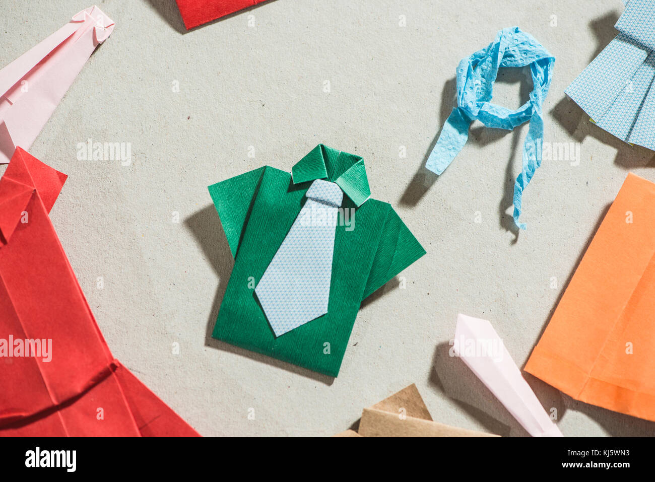 Many clothes origami. Made of paper fugures Stock Photo - Alamy