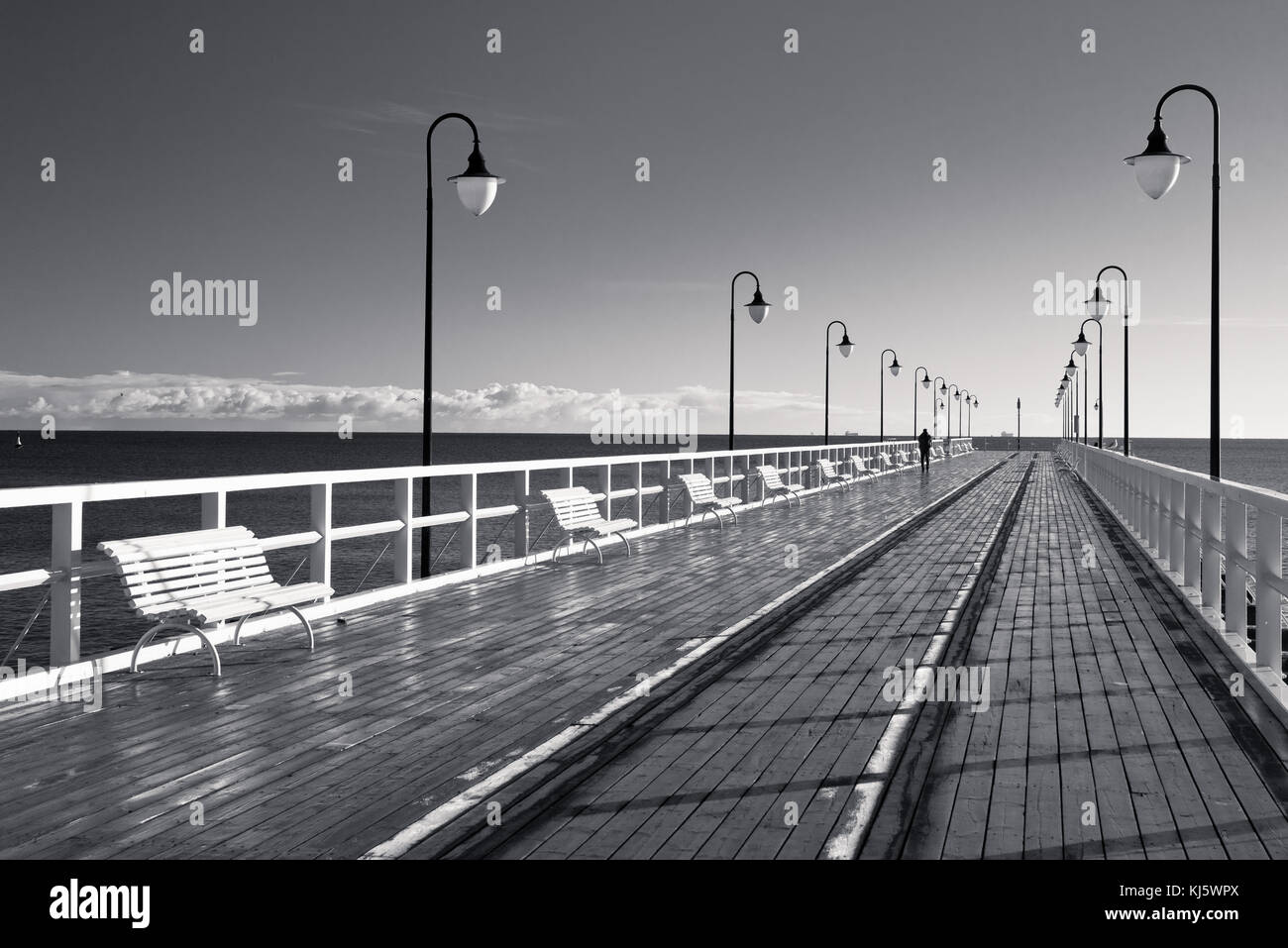Sunny day long wood pier hi-res stock photography and images - Alamy