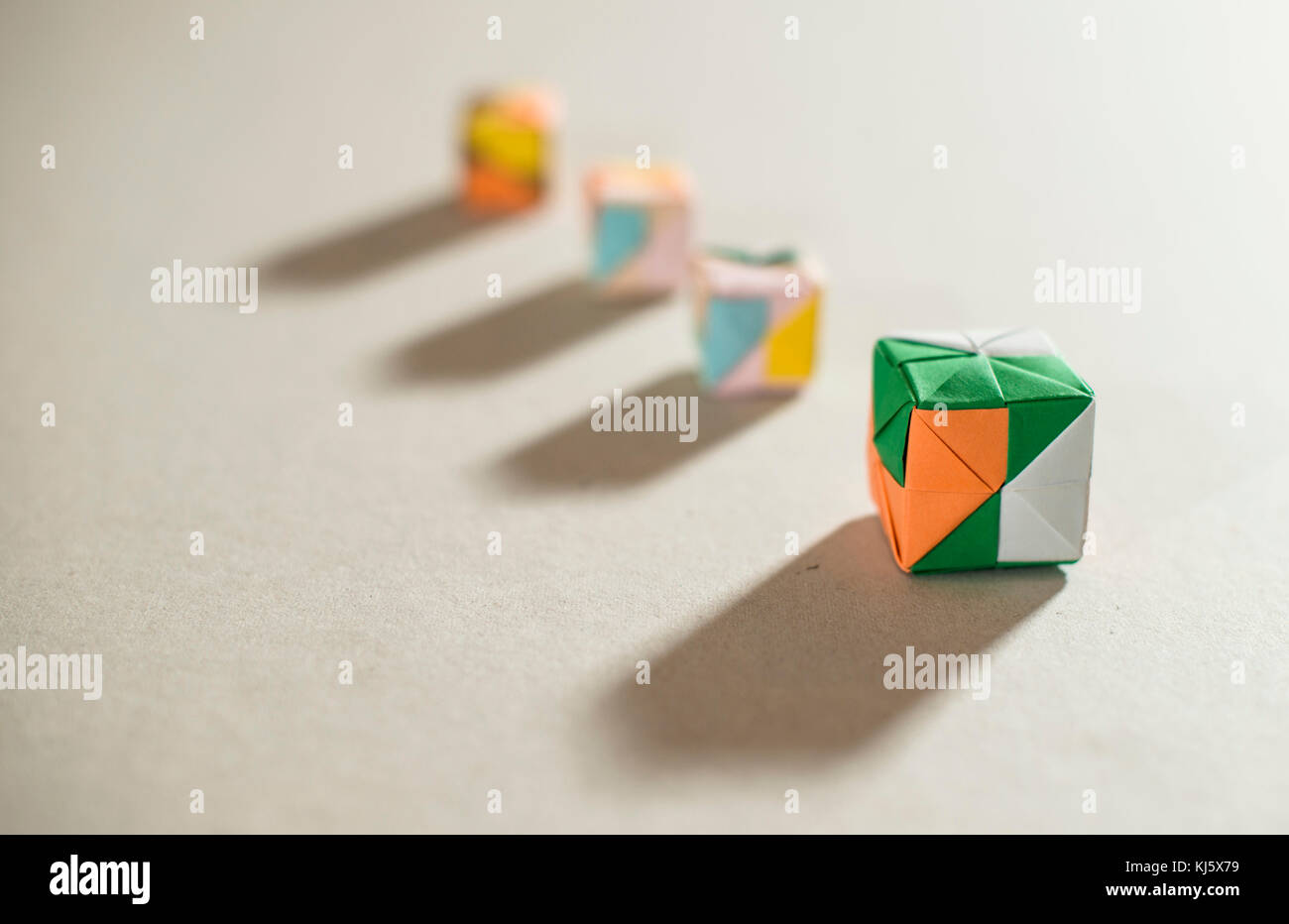 Origami cubes of paper Stock Photo - Alamy