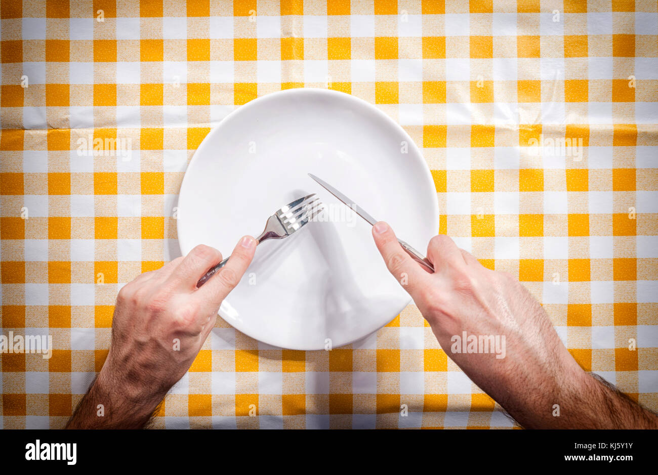 Empty white plate and human hands from above Stock Photo - Alamy