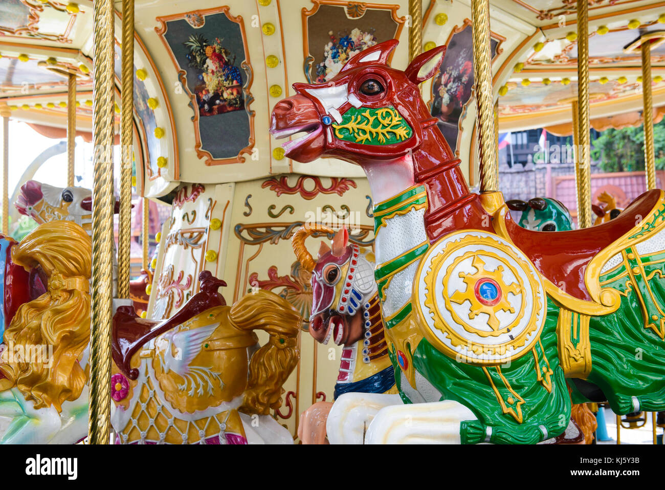 Vintage merry-go-round wooden horses Stock Photo - Alamy