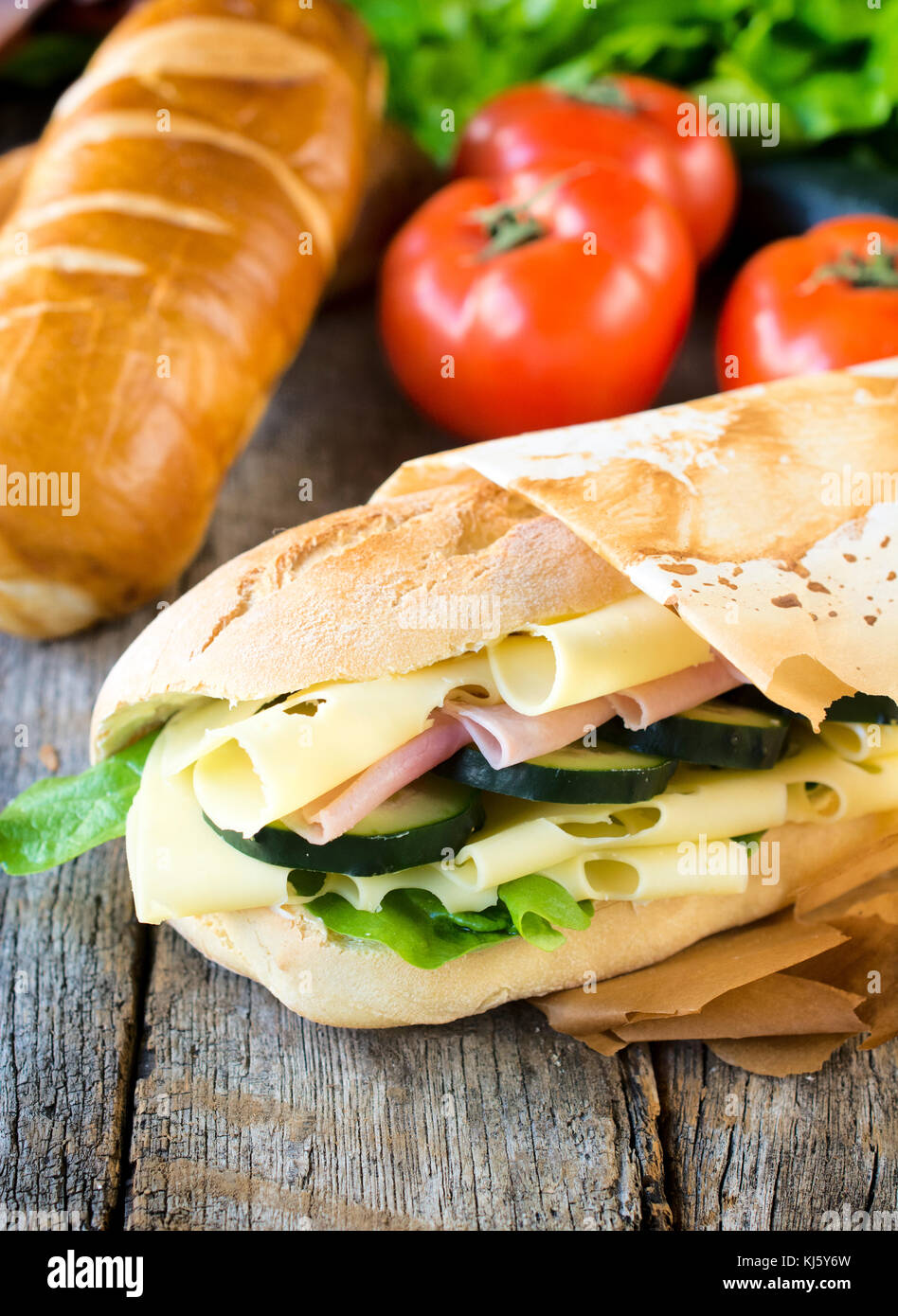 Fresh big sandwich with ham and cheese.selective focus on the sandwichs ...