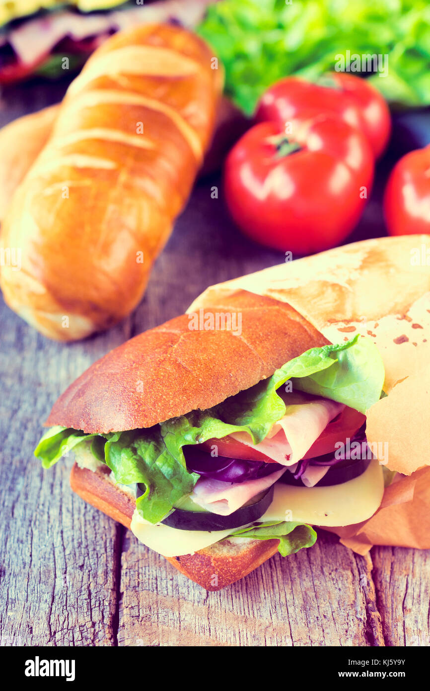 Fresh made sandwich with ham and vegetables.Selective focus on the ...