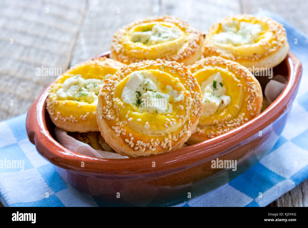 Golden color pastry stuffed with melting cheese.Selective focus on the ...